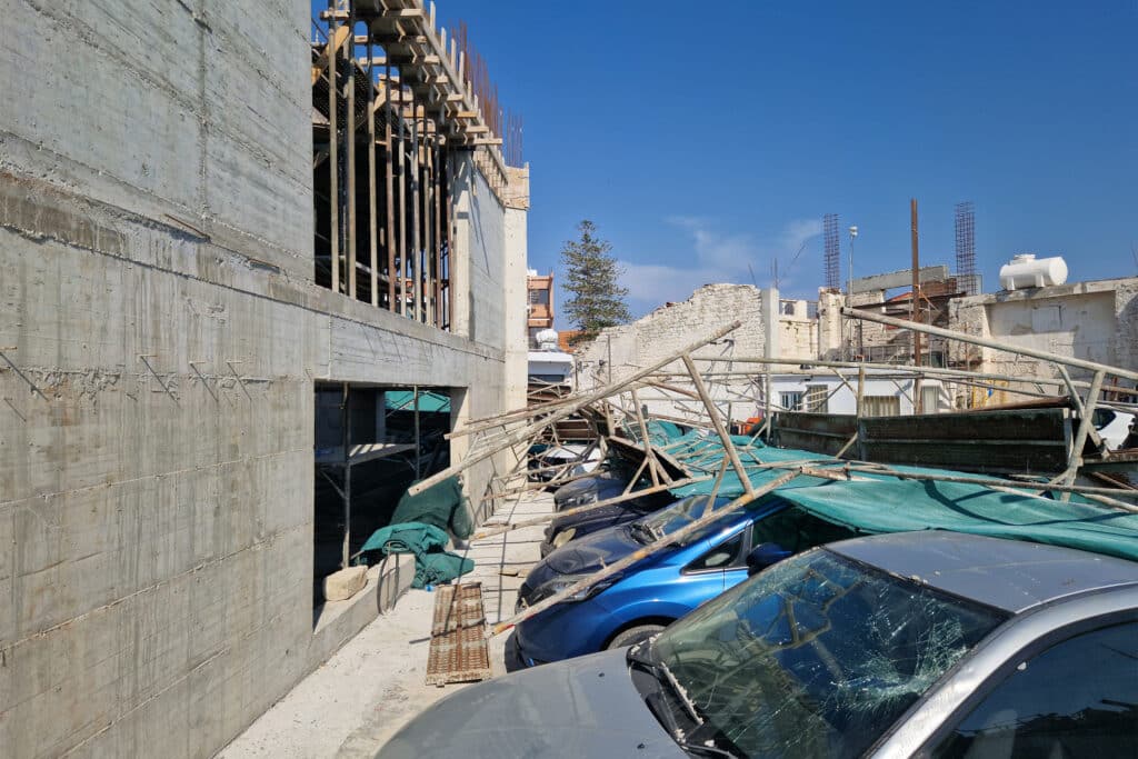 Scaffolding collapses, 12 cars damaged | Cyprus Mail